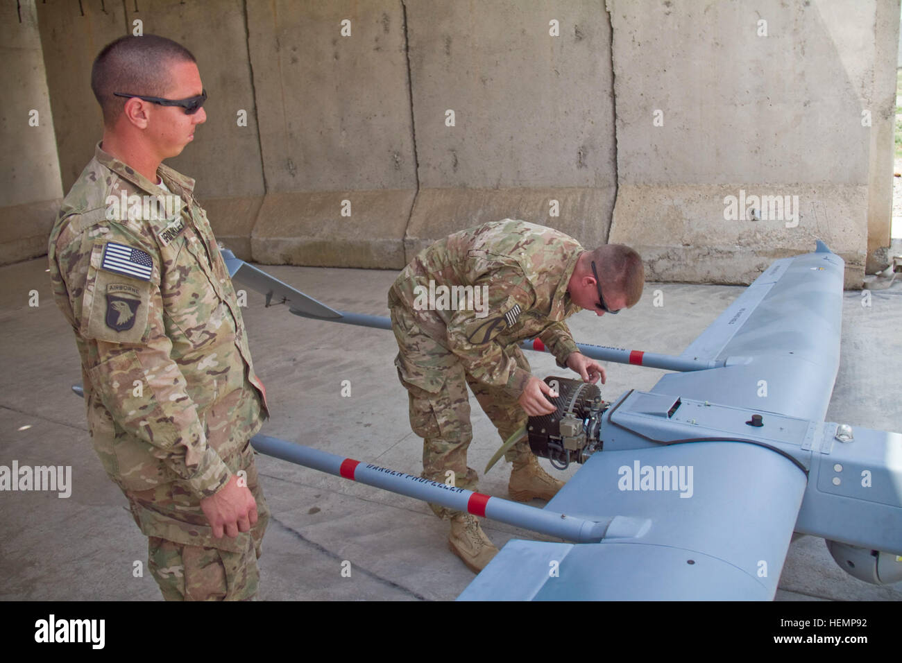 U.S. Army Spc. Jefferic S. Brinkley, left, observes Sgt. Joshua D ...