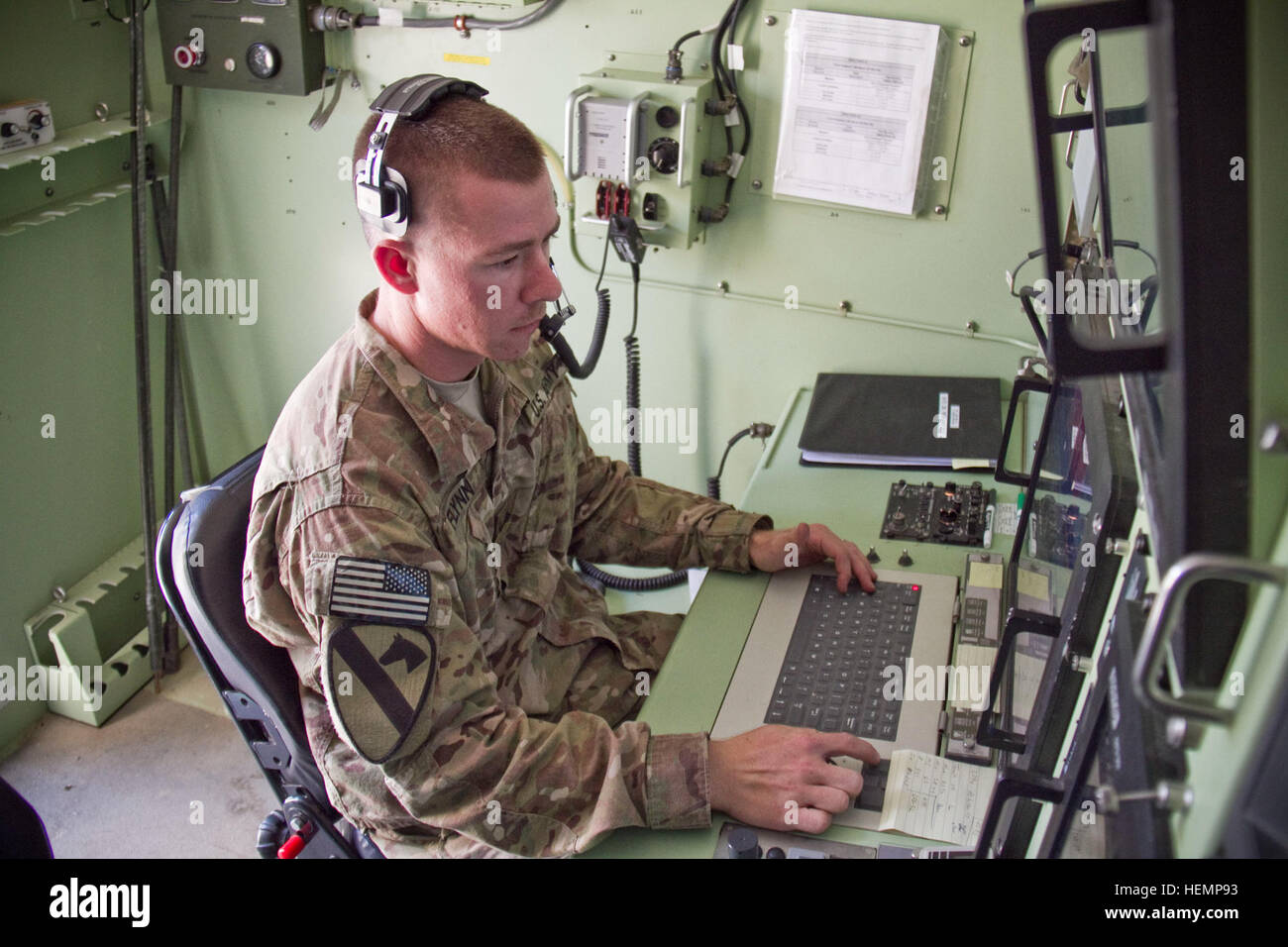U.S. Army Sgt. Joshua D. Flynn performs pre-flight checks on the ...