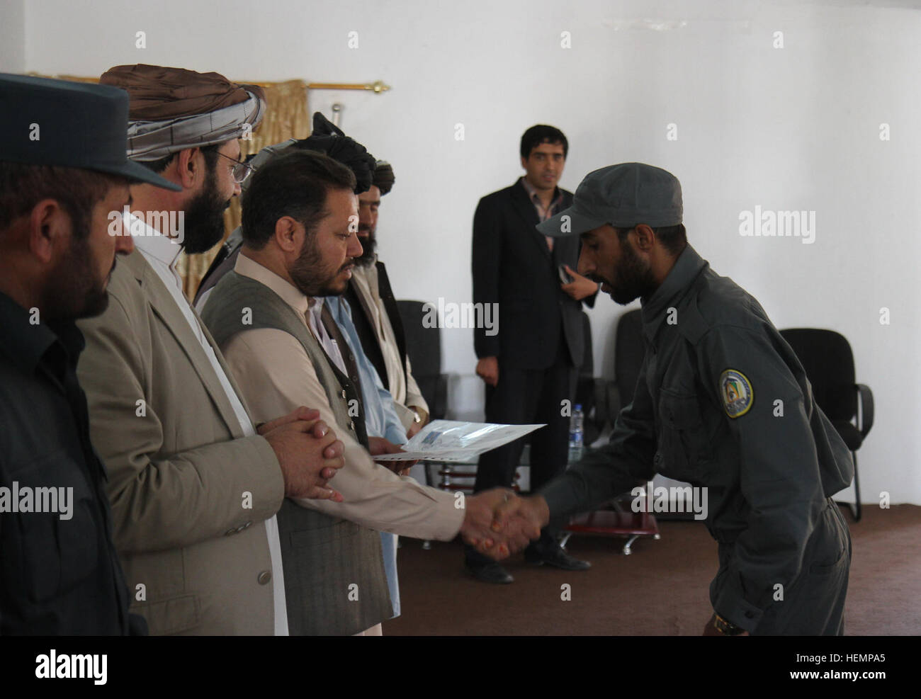 A recent Afghan Local Police graduate receives his course completing ...