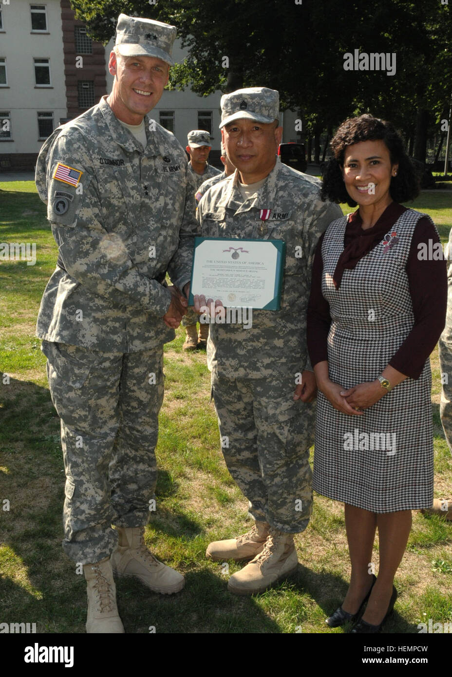 Sgt. 1st Class Filemon Garzon Jr. (center), a Chemical Biological ...
