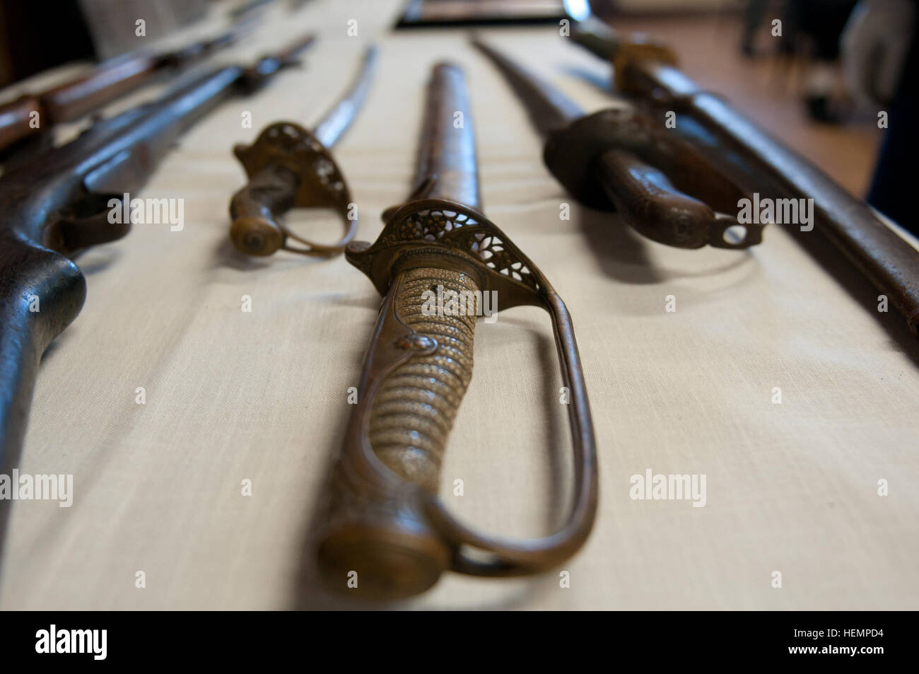 Martin L. Paulson displayed swords he collected during the assault and ...