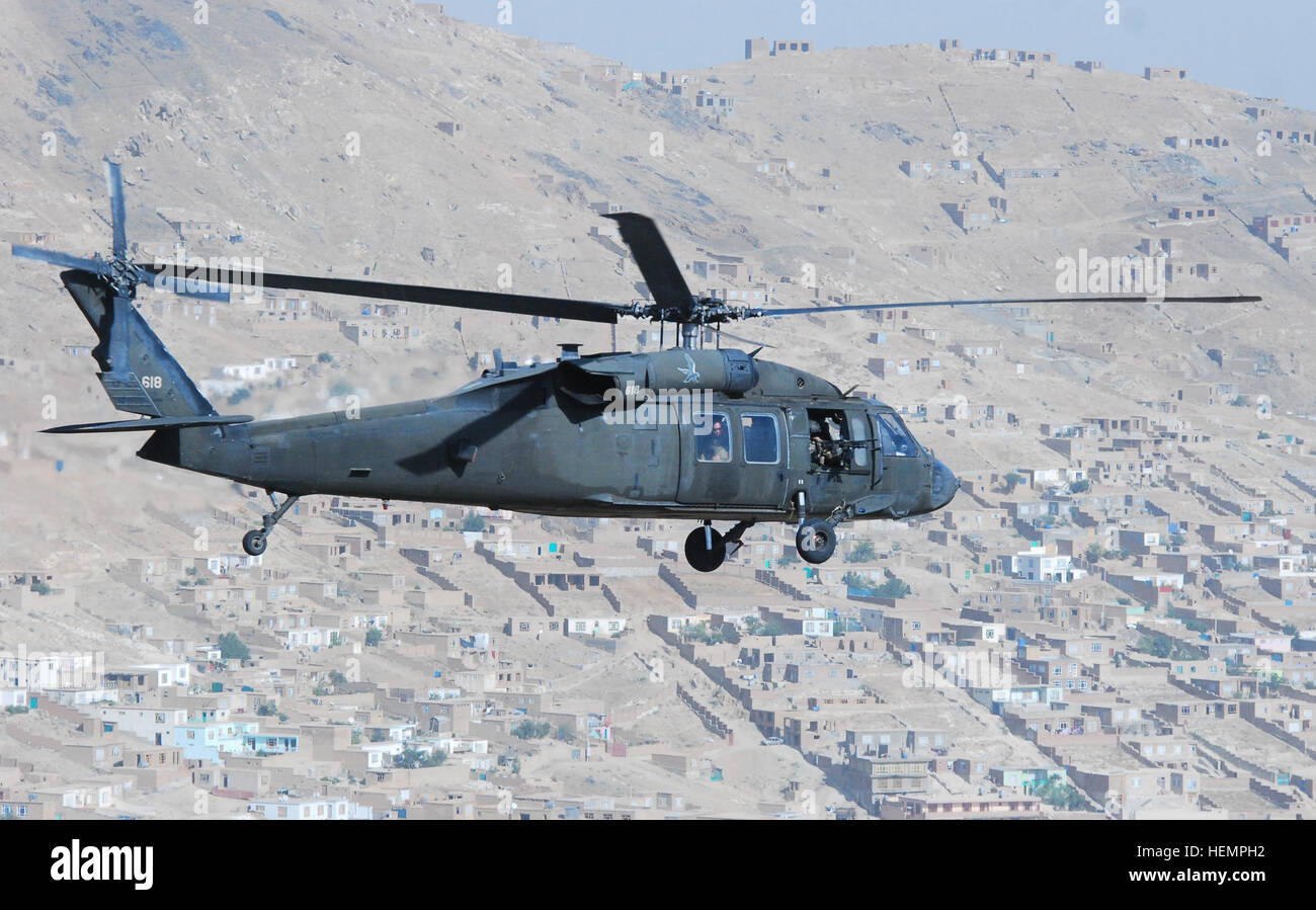 An UH-60L Black Hawk helicopter crewed by 1st Lt. Chuck Nadd, Chief ...