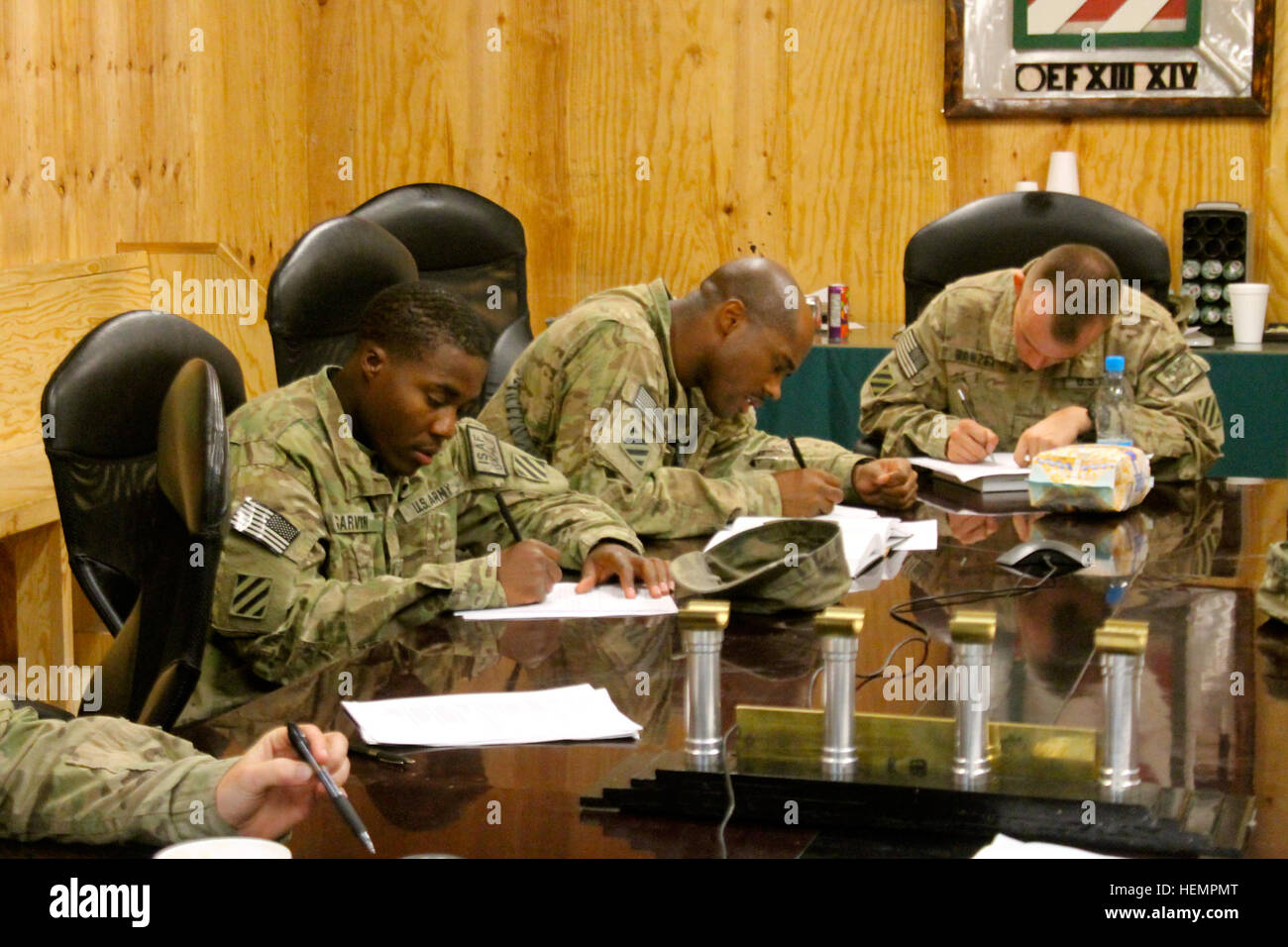 U.S. Army Spc. Arid Garvin, left, a motor transport operator with ...