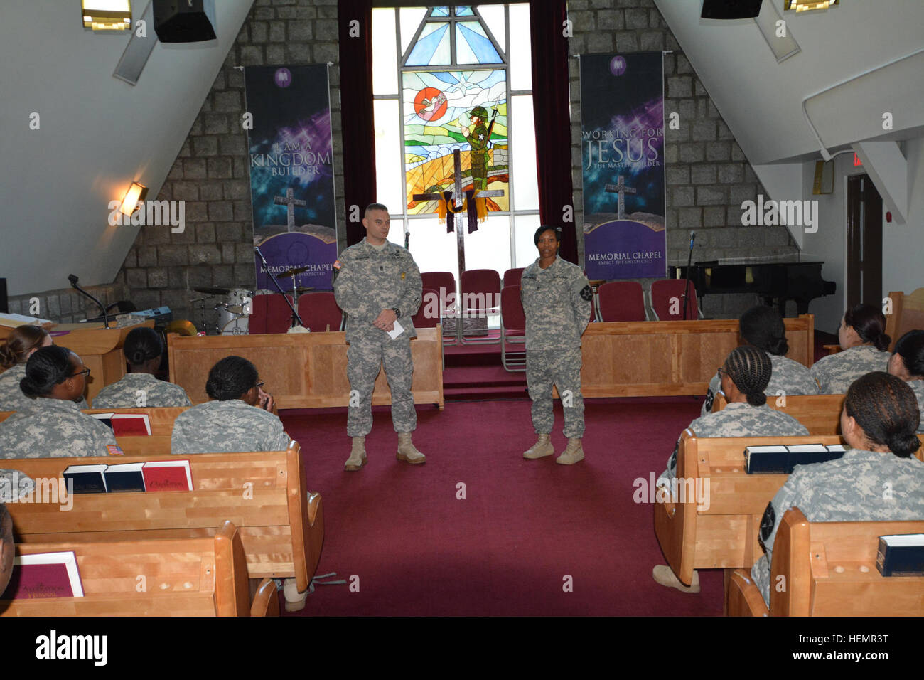 U.S. Army Command Sgt. Maj. Mark Brinton, left, the 210th Fires Brigade ...