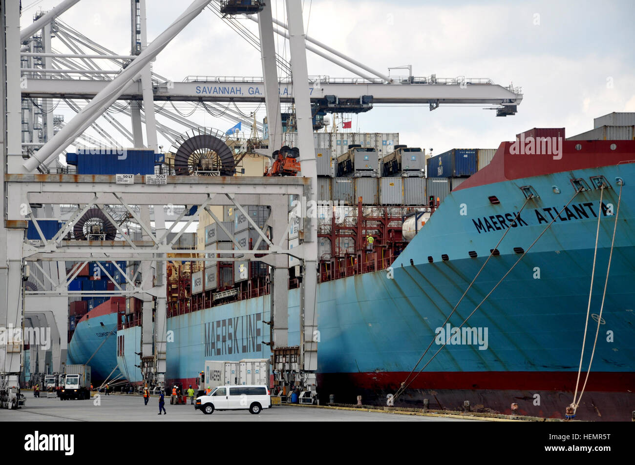 Personnel unload cargo from hi-res stock photography and images - Alamy