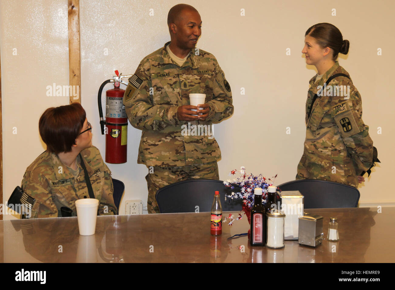 U.S. Army Reserve Command Sgt. Maj. Luther Thomas Jr. talks with Sgt ...