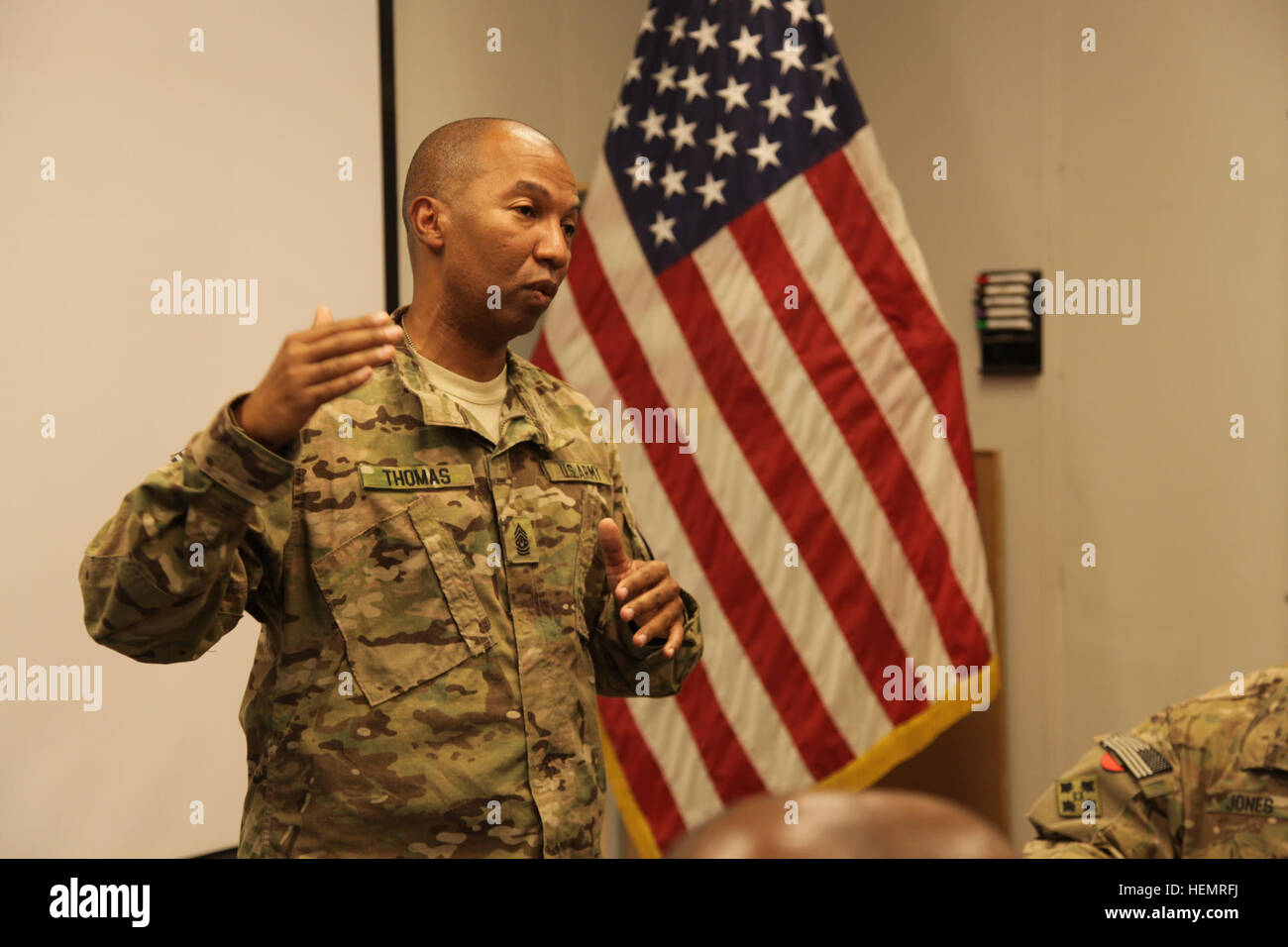 U.S. Army Reserve Command Sgt. Maj. Luther Thomas Jr. speaks with ...