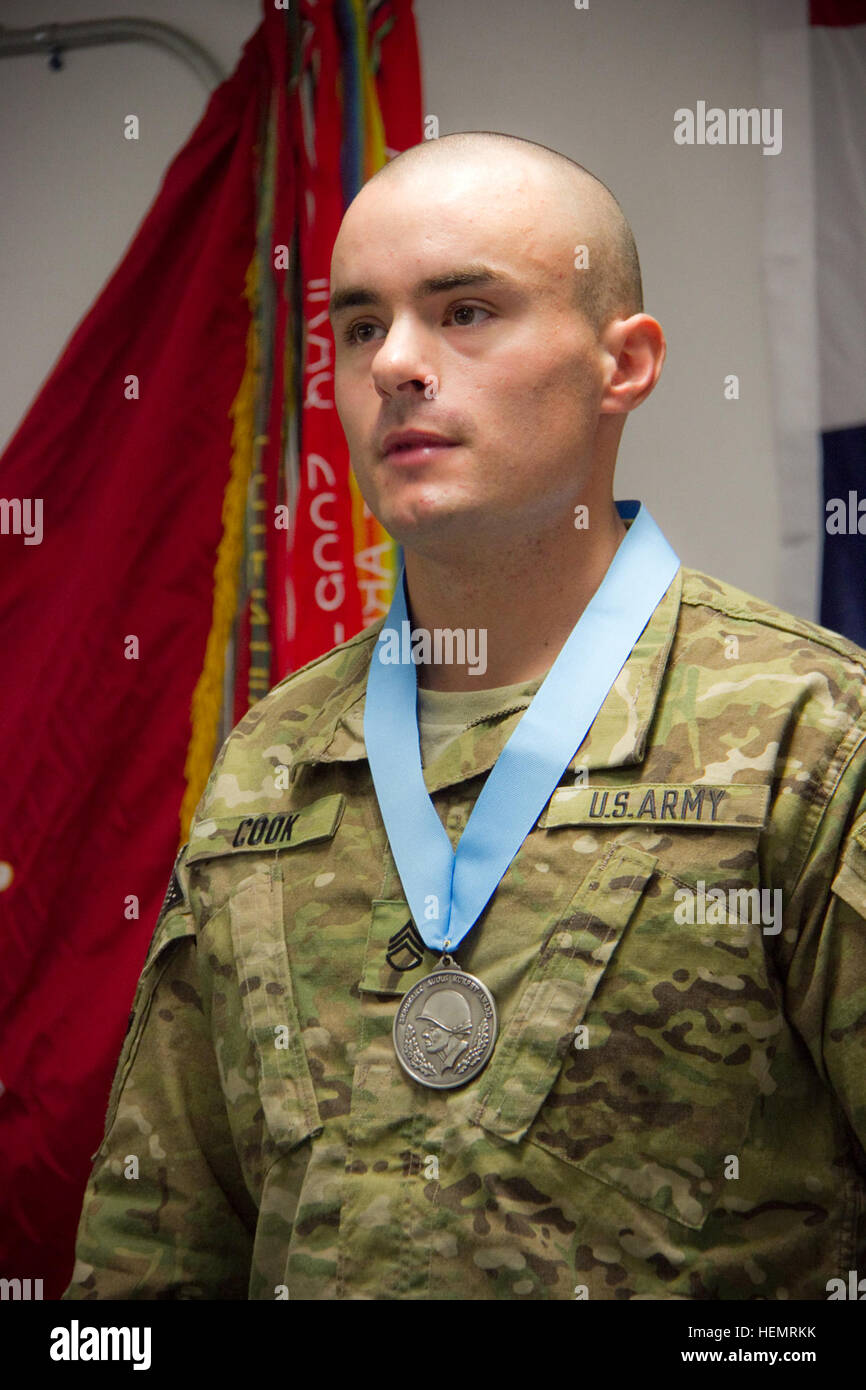 U.S. Army Staff Sgt. Joshua Cook, a cannon crew member with Battery A ...
