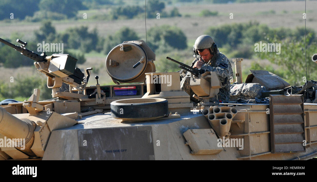 A Soldier with an M1A2 Abrams Tank crew and 3rd Battalion, 8th Cavalry ...