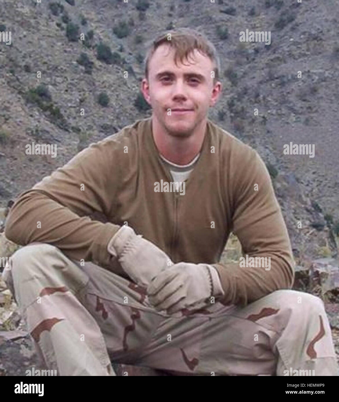 Robert James Miller sitting crop Stock Photo - Alamy