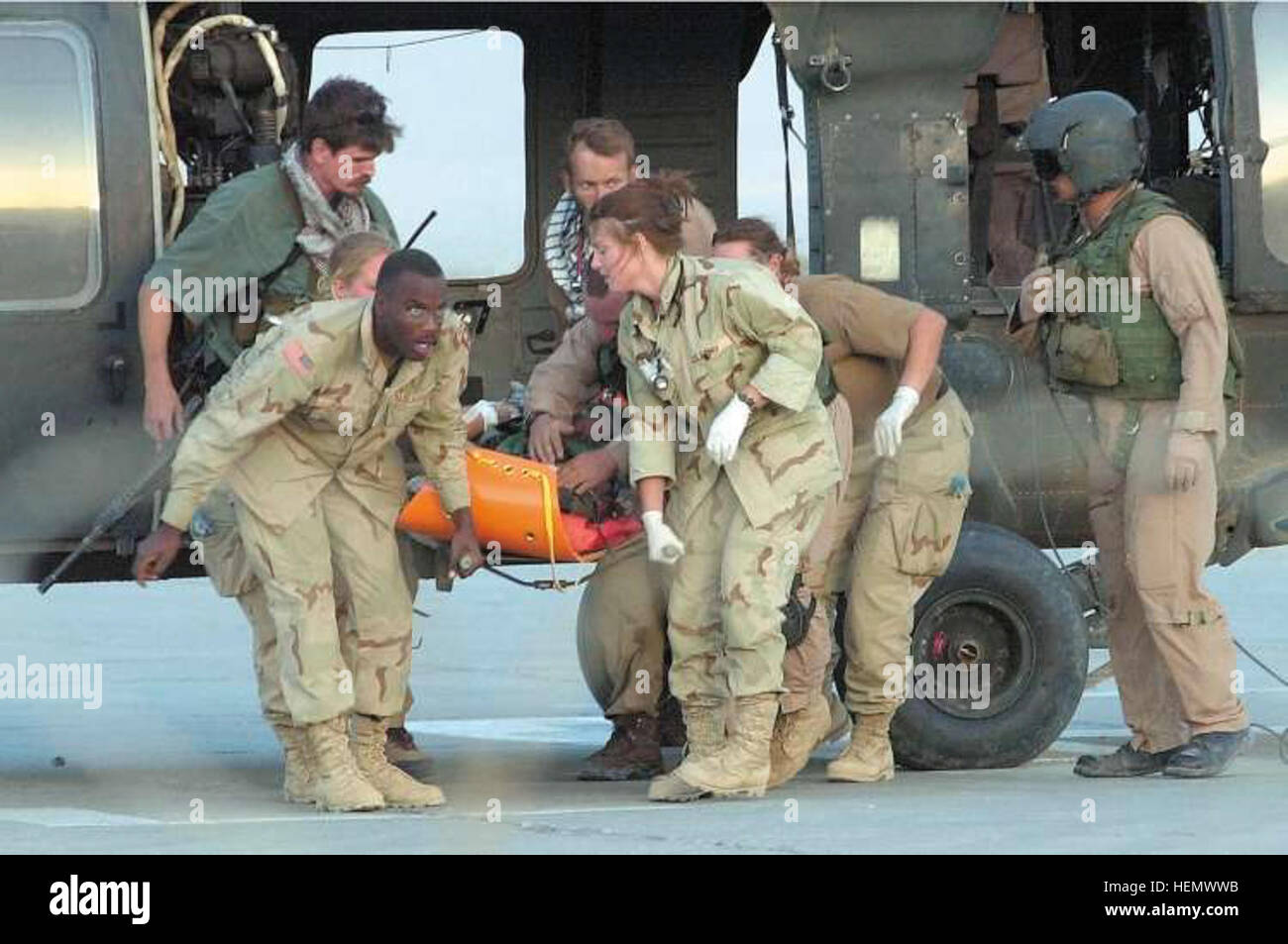 U.S. Army personnel from the 396th Medical Company unload supplies and ...