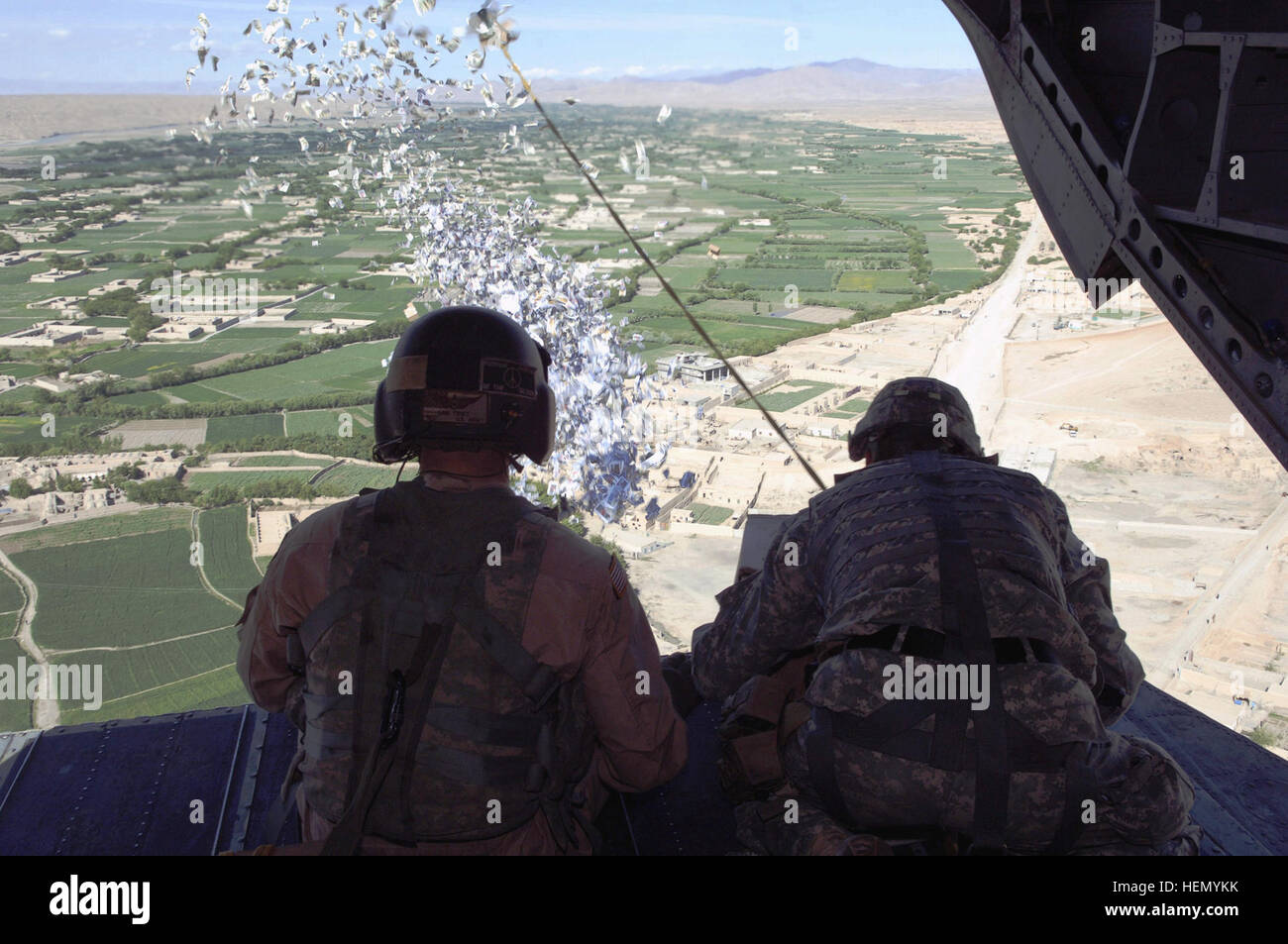 US Army (USA) Reserve (USAR) Sergeant First Class (SFC) Len Tidey (left ...
