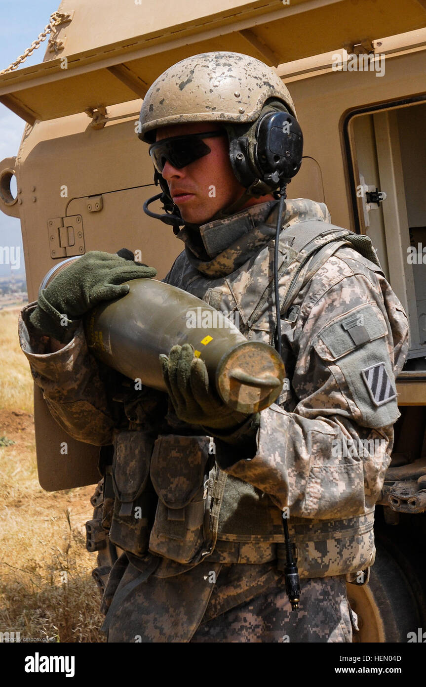A soldier from 1-9 Field Artillery operates the M109A6 Paladin ...