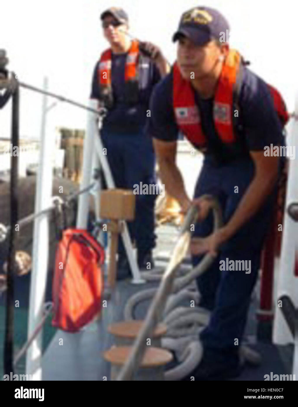 Reeling in a line, USCG Okracoke, Guantanamo Stock Photo - Alamy