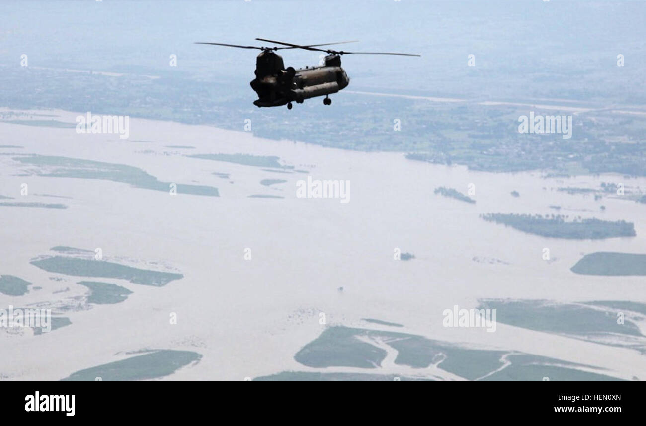 US Army helicopter flies over a flood-affected area of Pakistan Cut2 ...