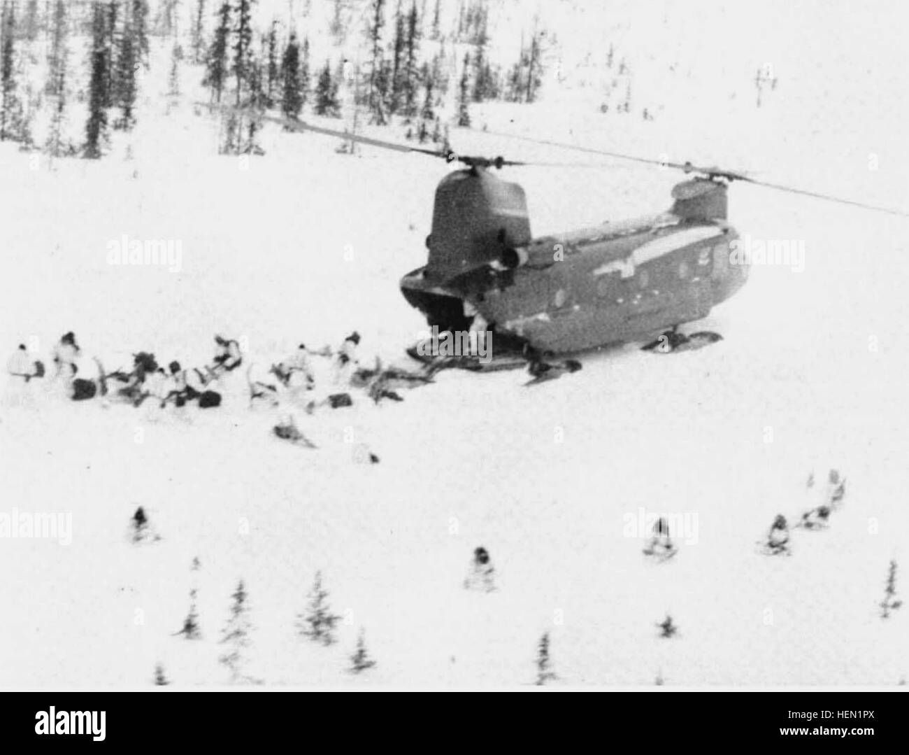 U.S. Army soldiers in Arctic combat uniforms disembark from a CH-47 ...