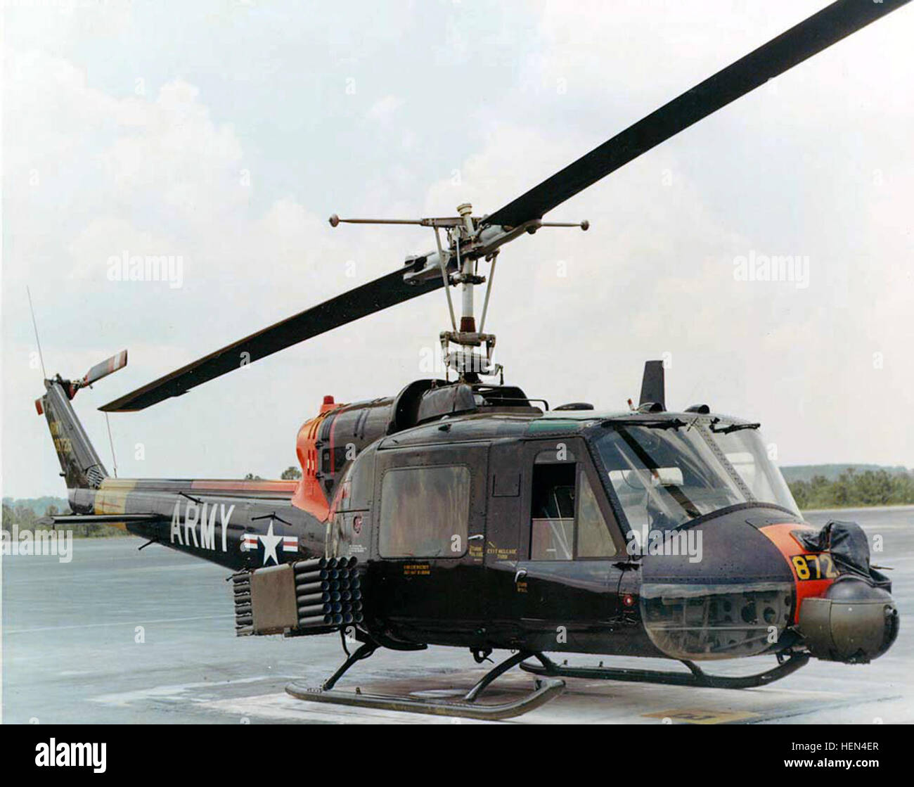 Bell UH-1 with rockets and minigun turret Stock Photo - Alamy