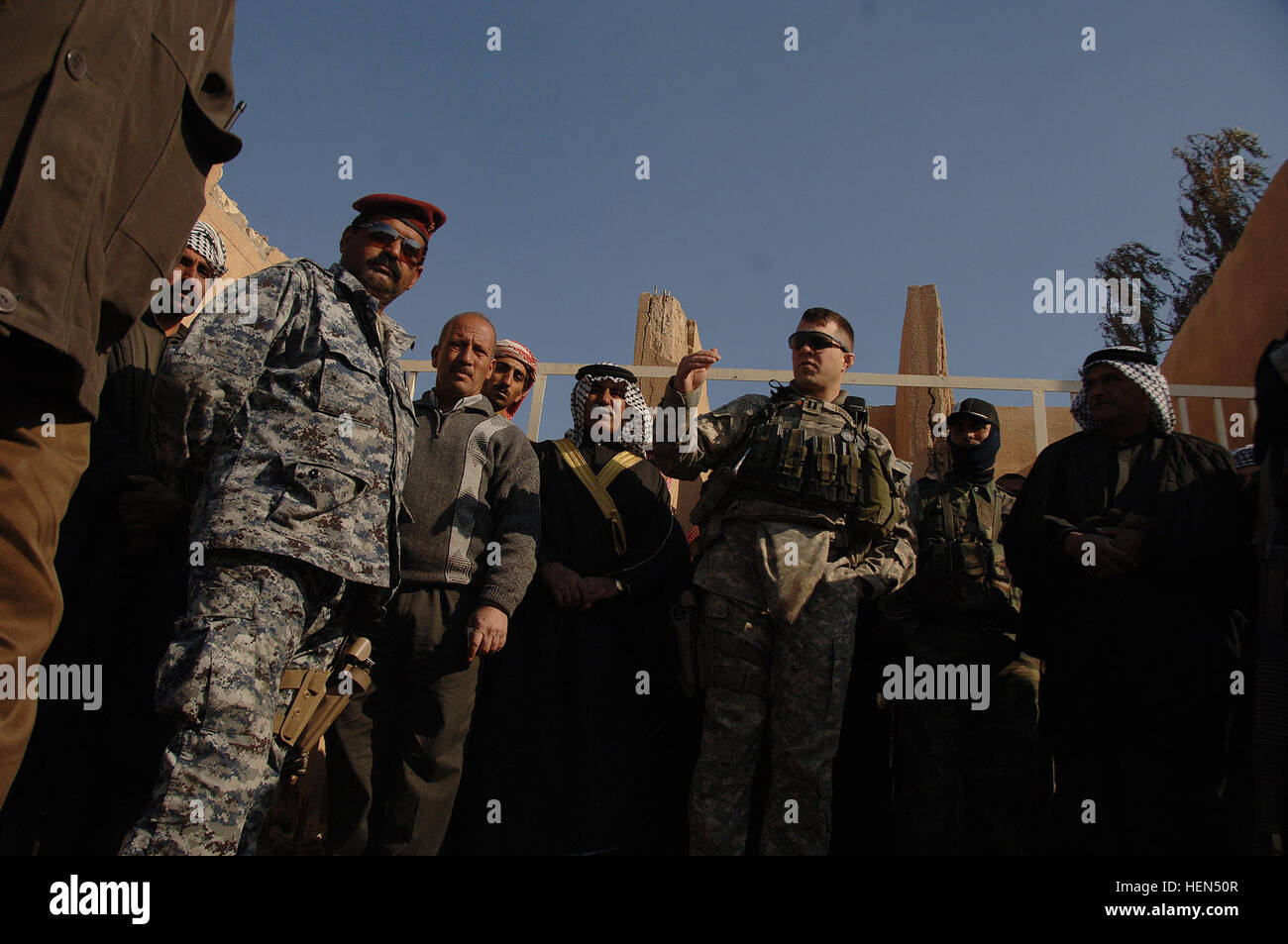 U.S. Army Capt. Troy Thomas (center) from Troop-A, 3-1 Cavalry Regiment ...