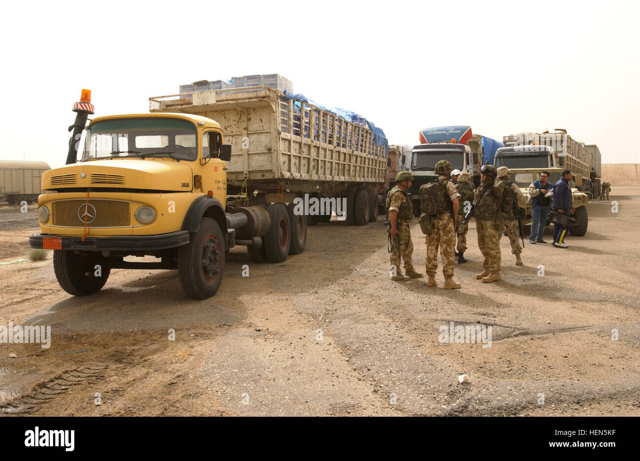 Trucks with humanitarian aid being leave Kuwait and enter Umm Qasr ...