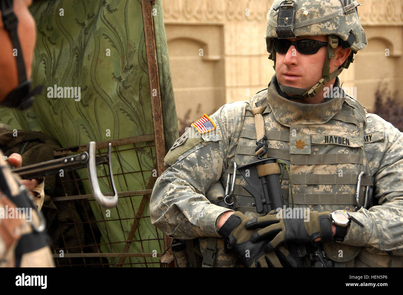 U.S. Army personnel from the Military Transition Team conduct traffic ...