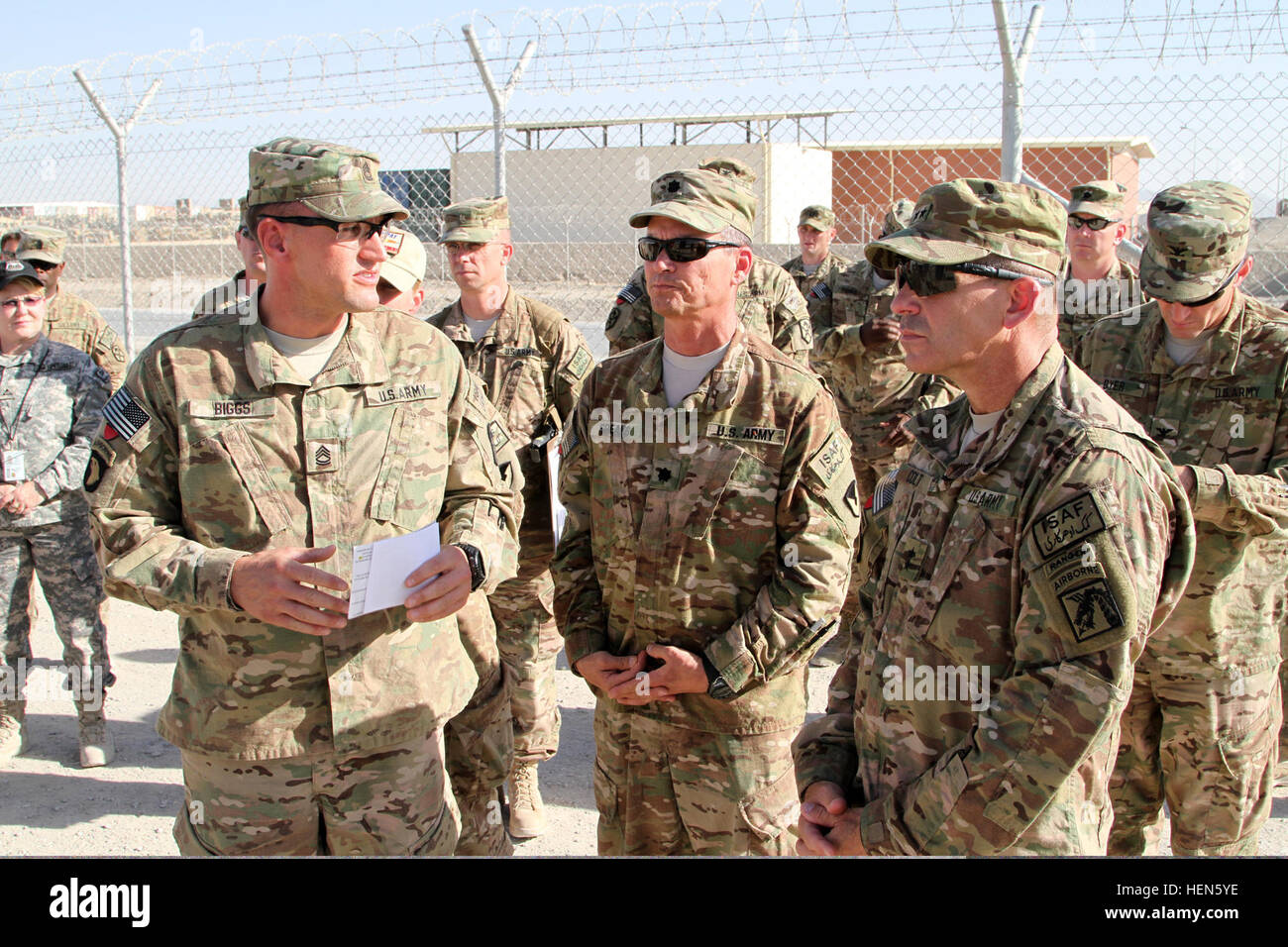 U.S. Army Sgt. 1st Class Matthew W. Biggs, front left, a retrograde ...