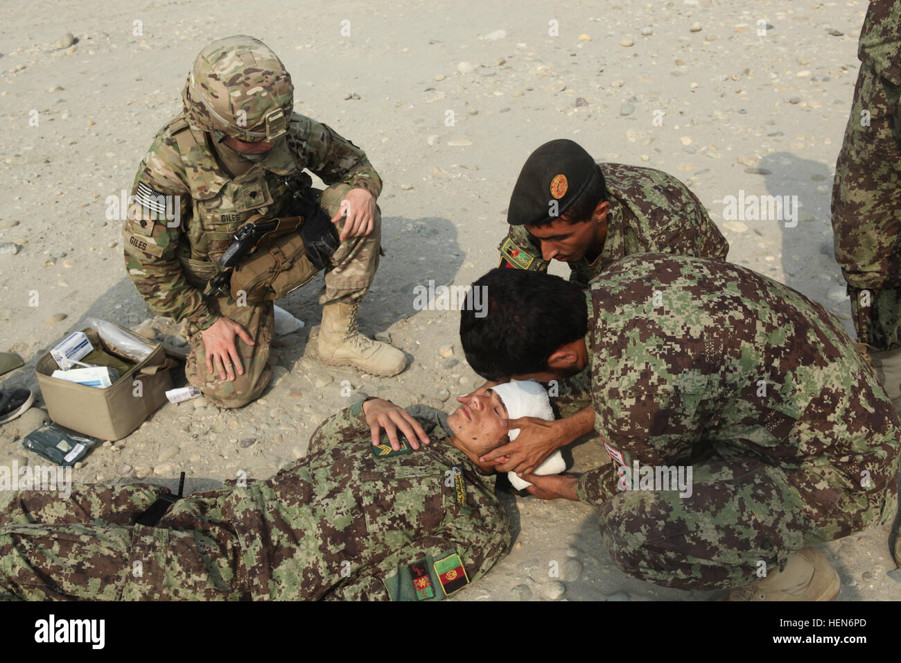 U.S. Army Spc. Chris Giles, medic with the 122nd Engineer Battalion ...
