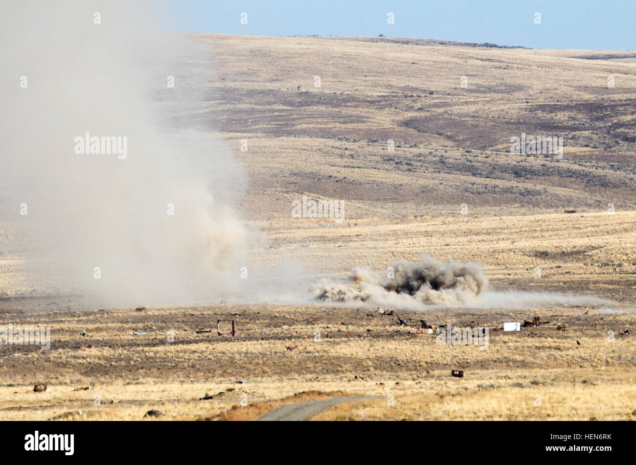 A 155 mm round from a M777A2 howitzer cannon hits its target in the ...
