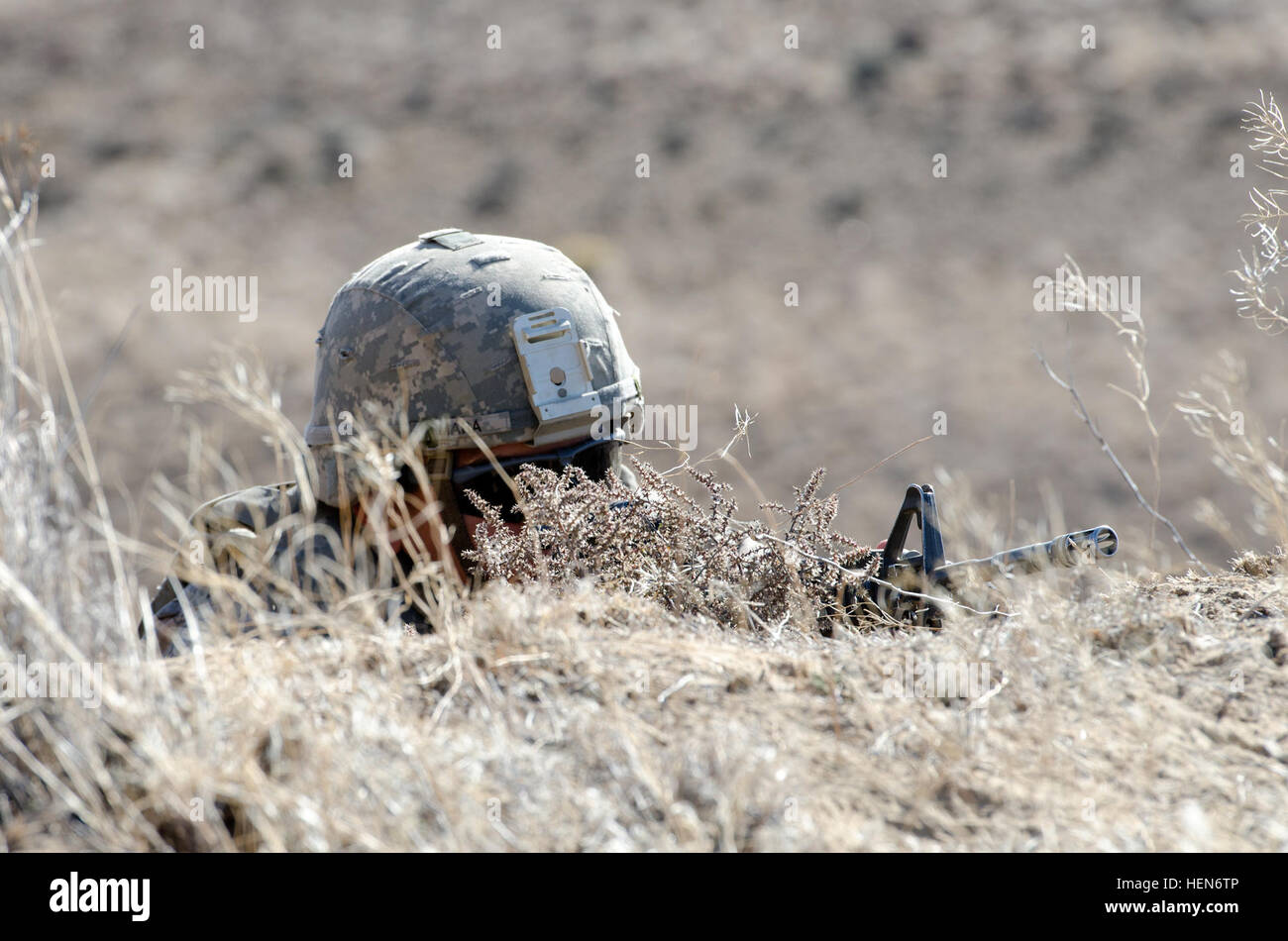 Pfc. Kainoa Mara, of Oahu, Hawaii, keeps a lookout from his defensive ...
