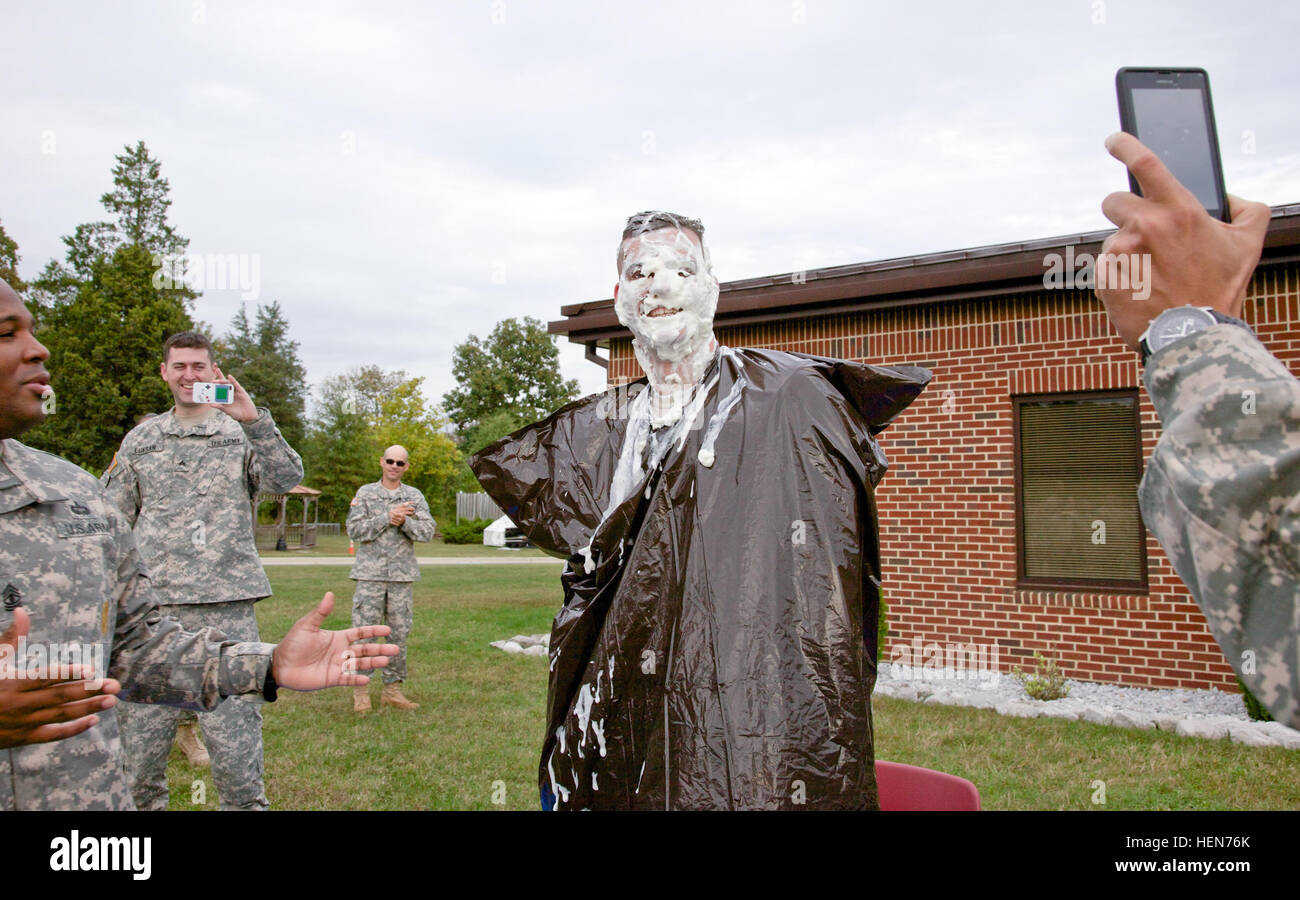 U.S. Army 1st Lt. Justin Weis (center) poses for photos with whipped ...