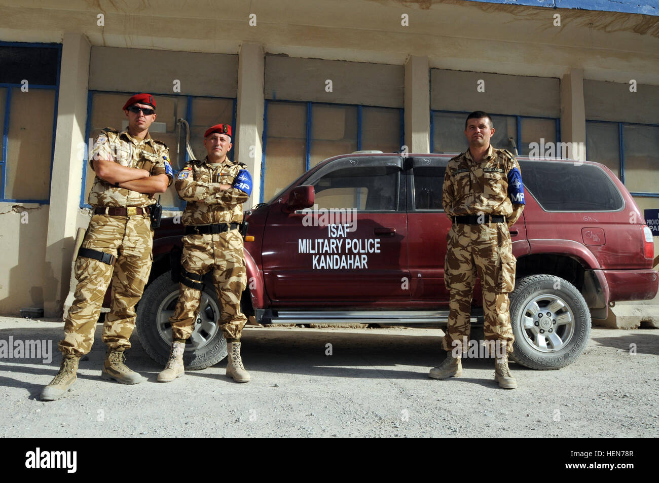 From left, Staff Sgt. Cristian Tanasescu, military patrolman ...