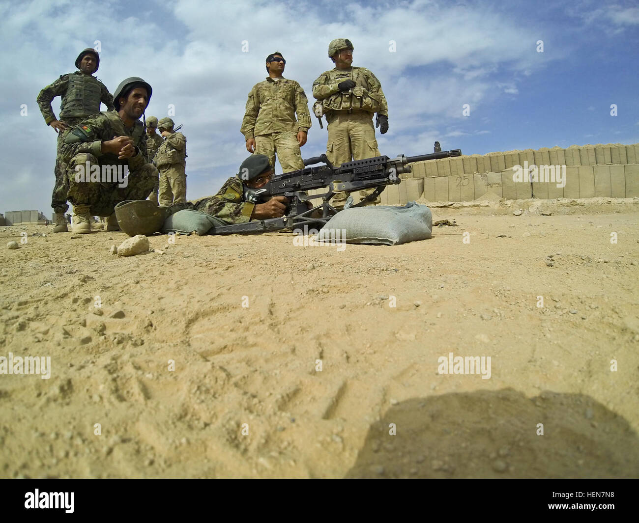 An Afghan National Army soldier with 3rd Brigade, 205th Corps, fires an ...