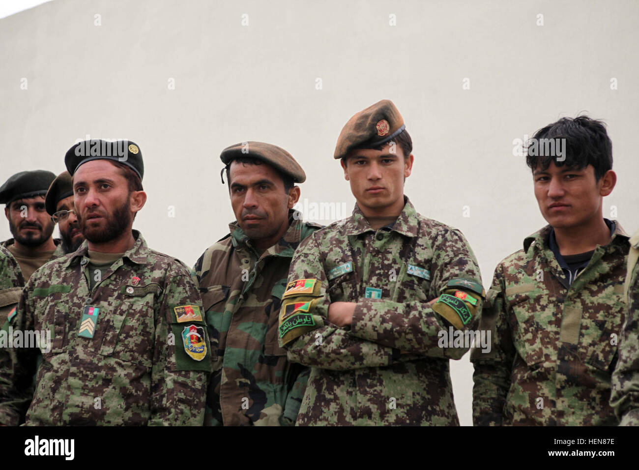 Afghan National Army (ANA) soldiers wait for a brass and ammunition ...