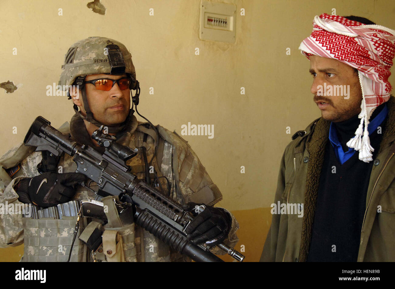 A U.S. Army Staff Sergeant trains Iraqi soldiers in movement techniques ...