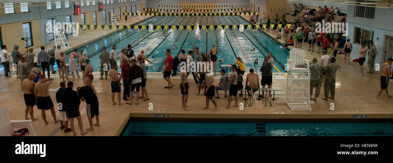 Participants and spectators gather at the Aquatics Training Center here ...