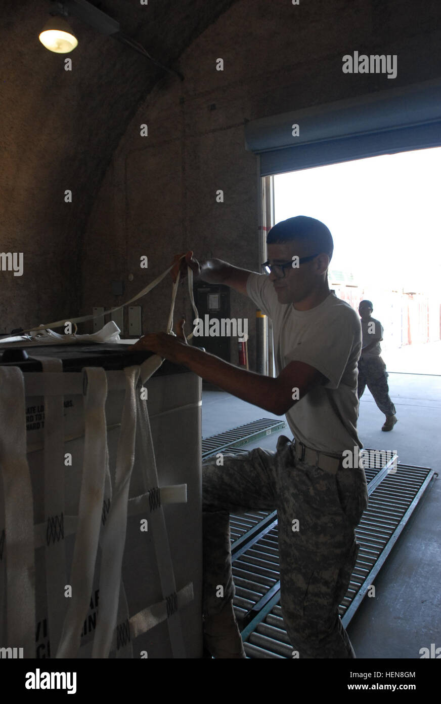 Spc. Luis C. Aguilar, a parachute rigger with the 861st Quartermaster ...