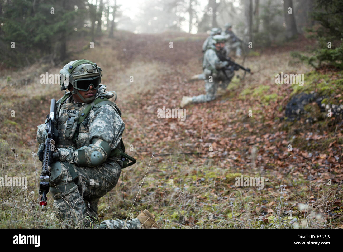 U.S. Army Spc. Anthony Sarrias, left, with Bravo Company, 1st Battalion ...