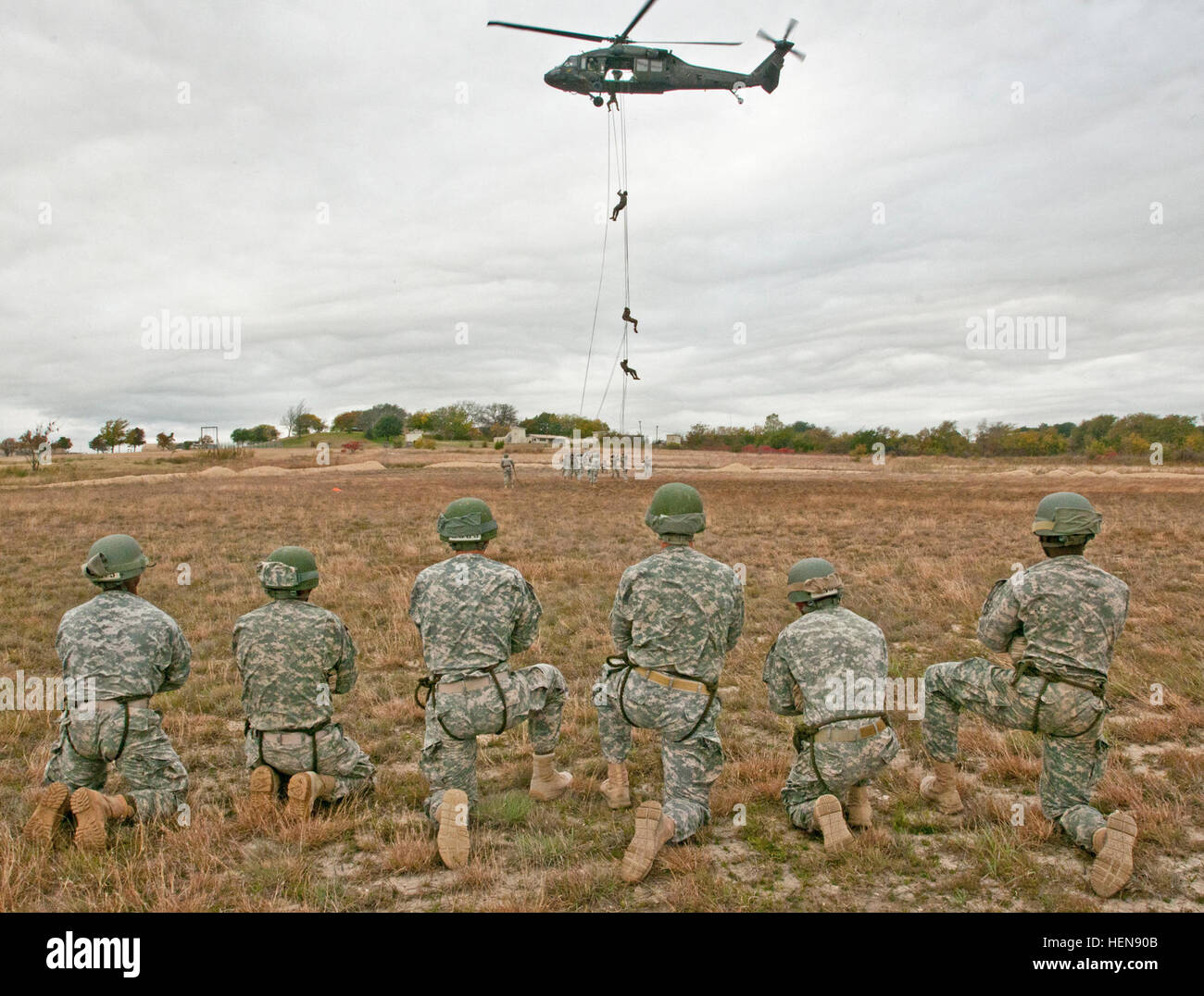 Students of Fort Hood Air Assault School class 02-14 wait their turn as ...