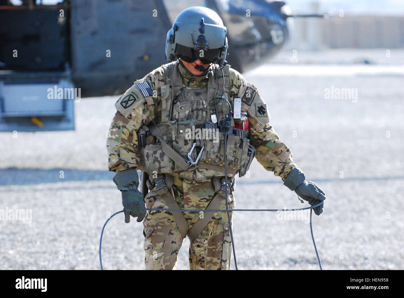 Staff Sgt. Ernie Botello, a CH-47 Chinook helicopter flight engineer ...