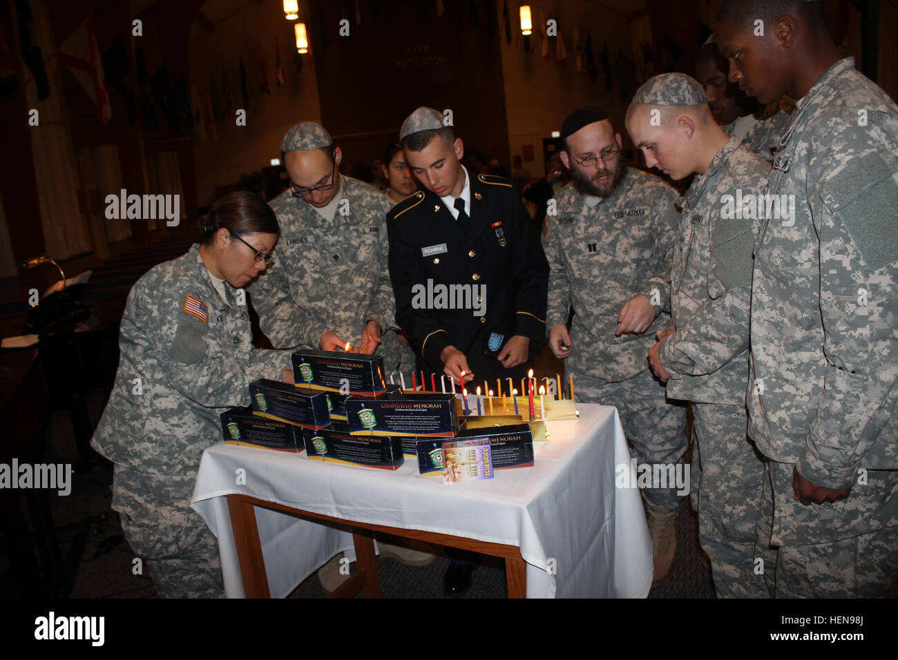 Capt. Mendy Stern, chaplain, second from right, leads soldiers in ...