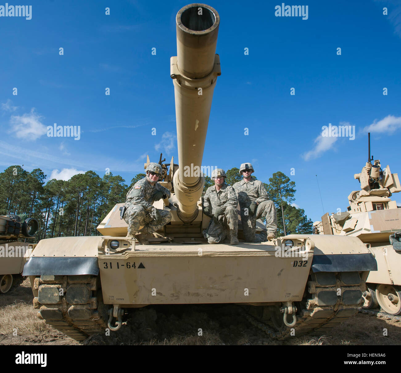 The crew of an M1A2SEP Abrams Tank from 1st Battalion, 64th Armor ...