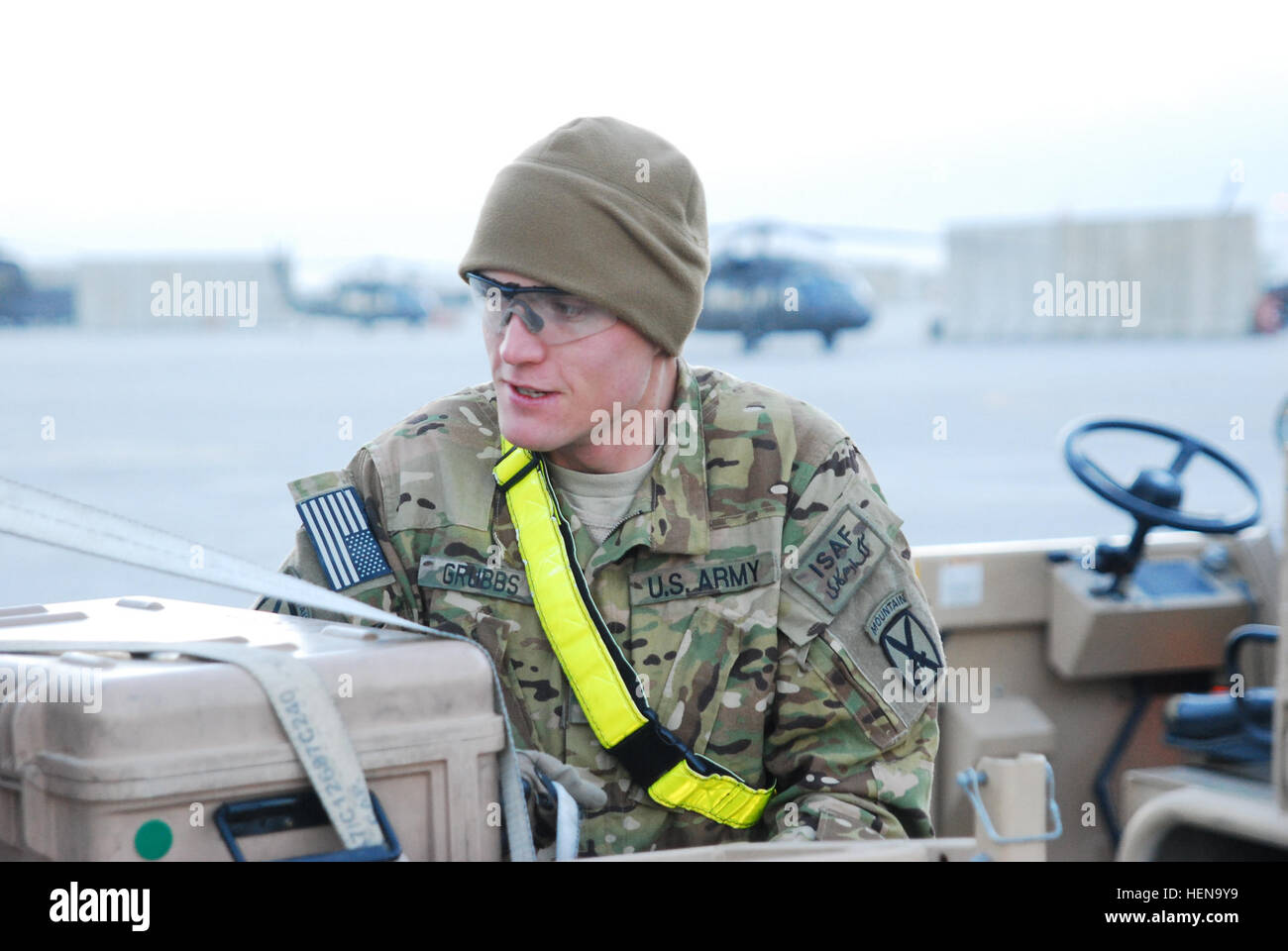 Spc. Jacob Grubbs, an AH-64 Apache helicopter Armament/Electrical ...