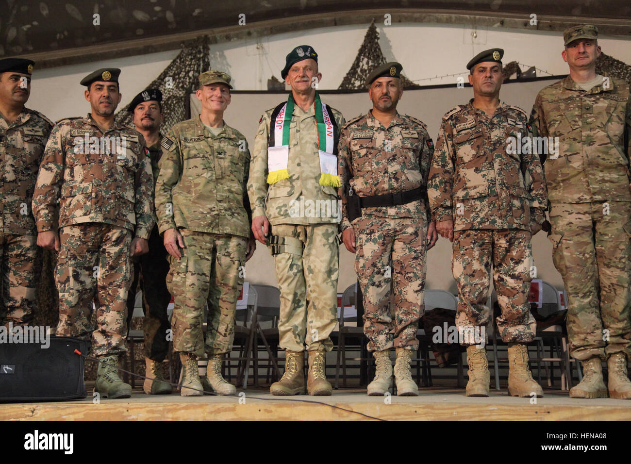 A Polish commander, center, and official party members pose for a photo ...