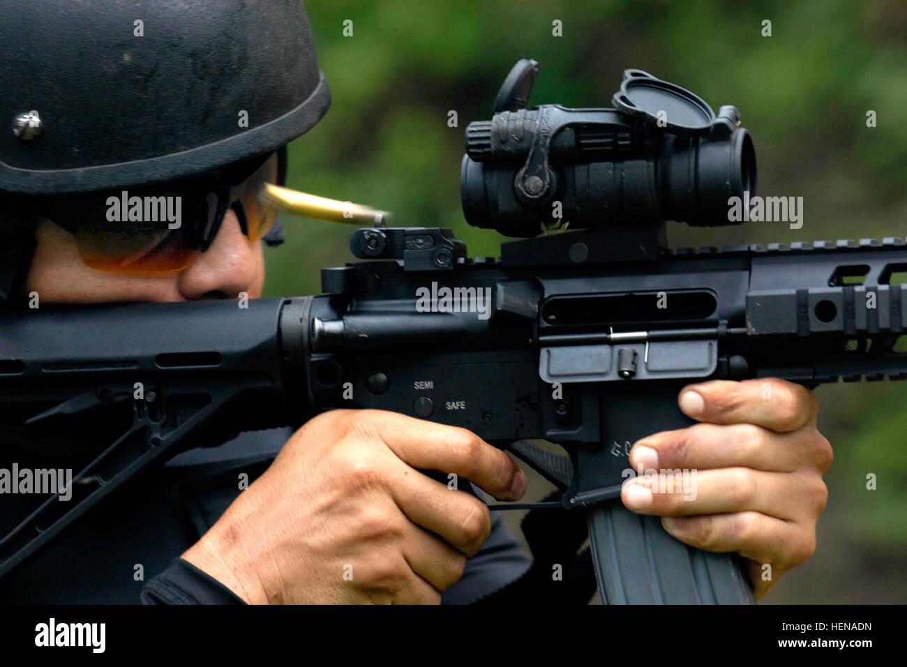 ILOPANGO, El Salvador – A Costa Rican special operations member engages ...