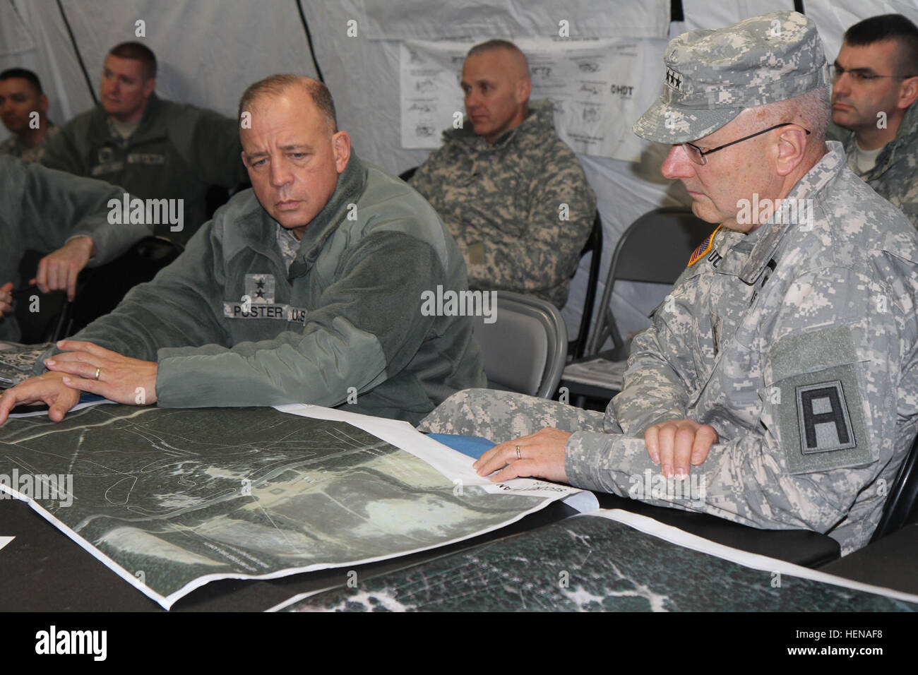 Senior Army commanders review a map of Tactical Assembly Area 863 at ...