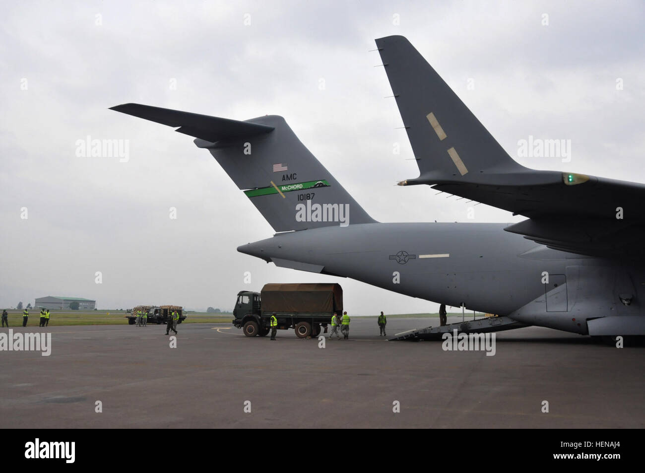 U.S. Airmen load Rwanda Defense Force equipment and personnel onto a U ...
