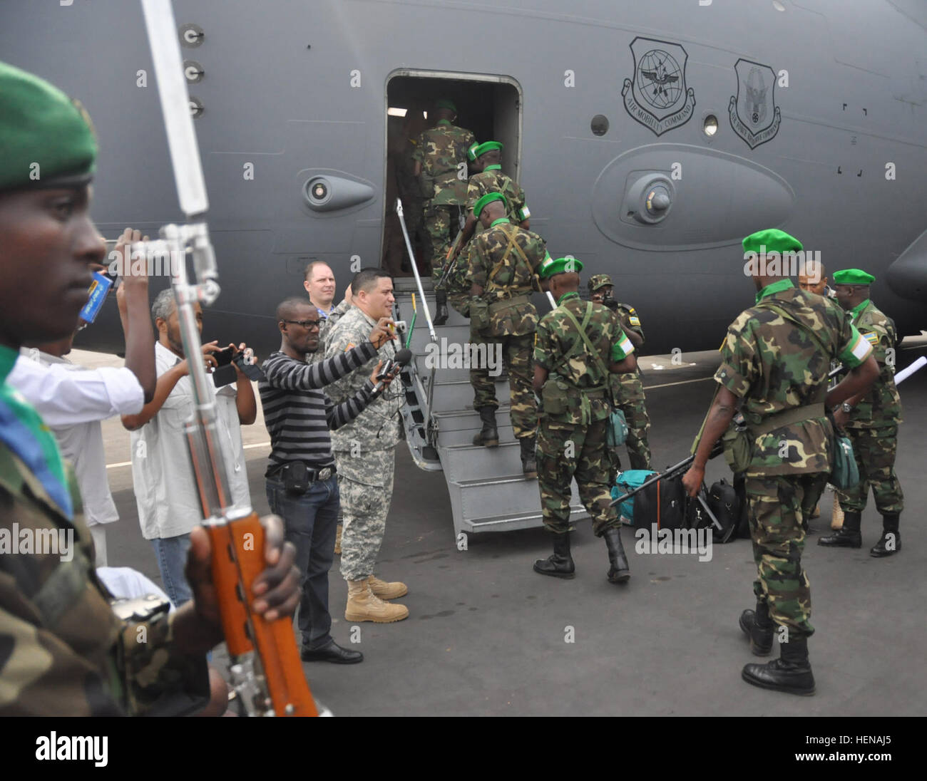 Rwandan soldiers board a U.S. Air Force C-17 Globemaster III aircraft ...
