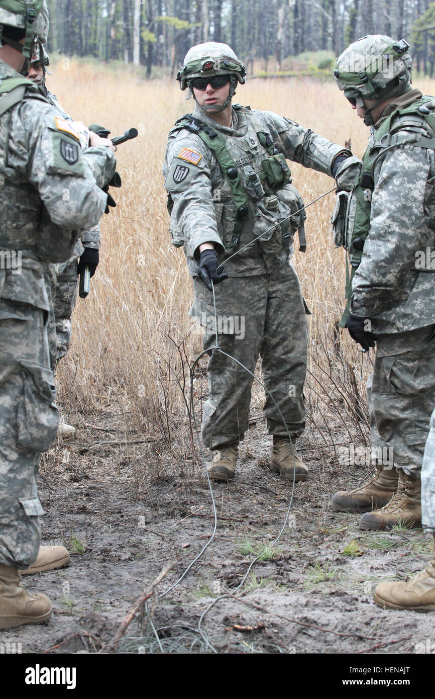 U.S. Army Sgt. 1st Class Louis Goldstein, center, with the 309th ...