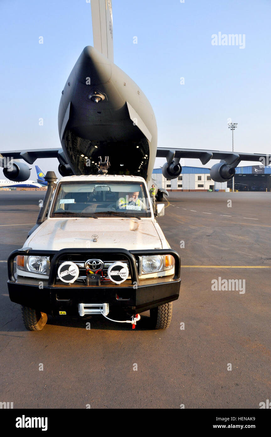 U.S. Air Force Tech. Sgt. Donald Gerhart backs a Rwanda Defense Force ...