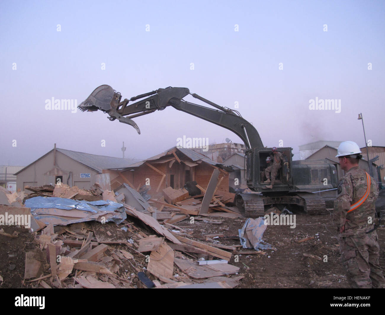 U.S. Army Capt. Robert Sanders, right foreground, the commander of the ...