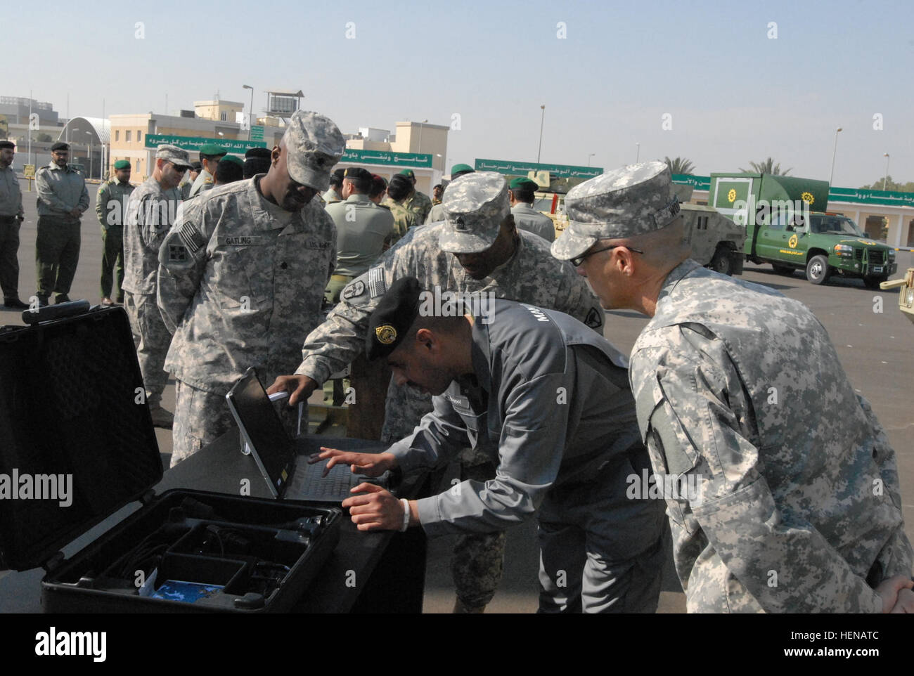 A Kuwait National Guard (KNG) soldier demonstrates a remote vehicle ...
